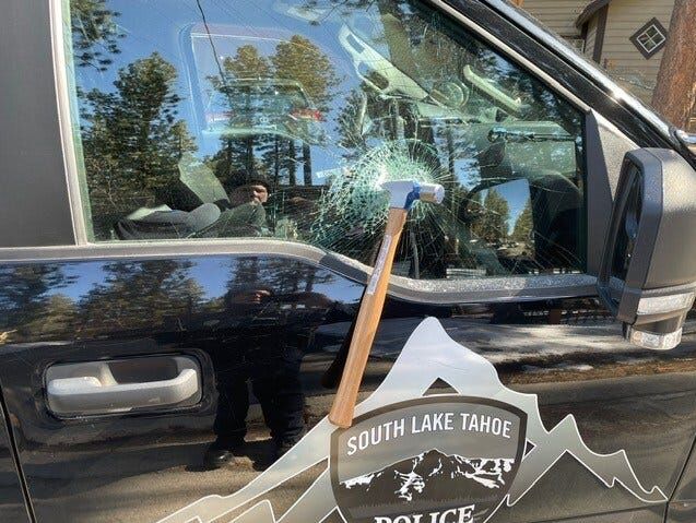 Suspect Stabs Man With Saw, Smashes Police Cruiser Window with Hammer ...