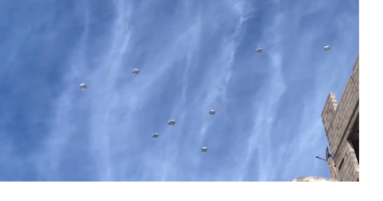 U.S. Military Aircraft Airdrop Thousands of Meals Into Gaza in ...