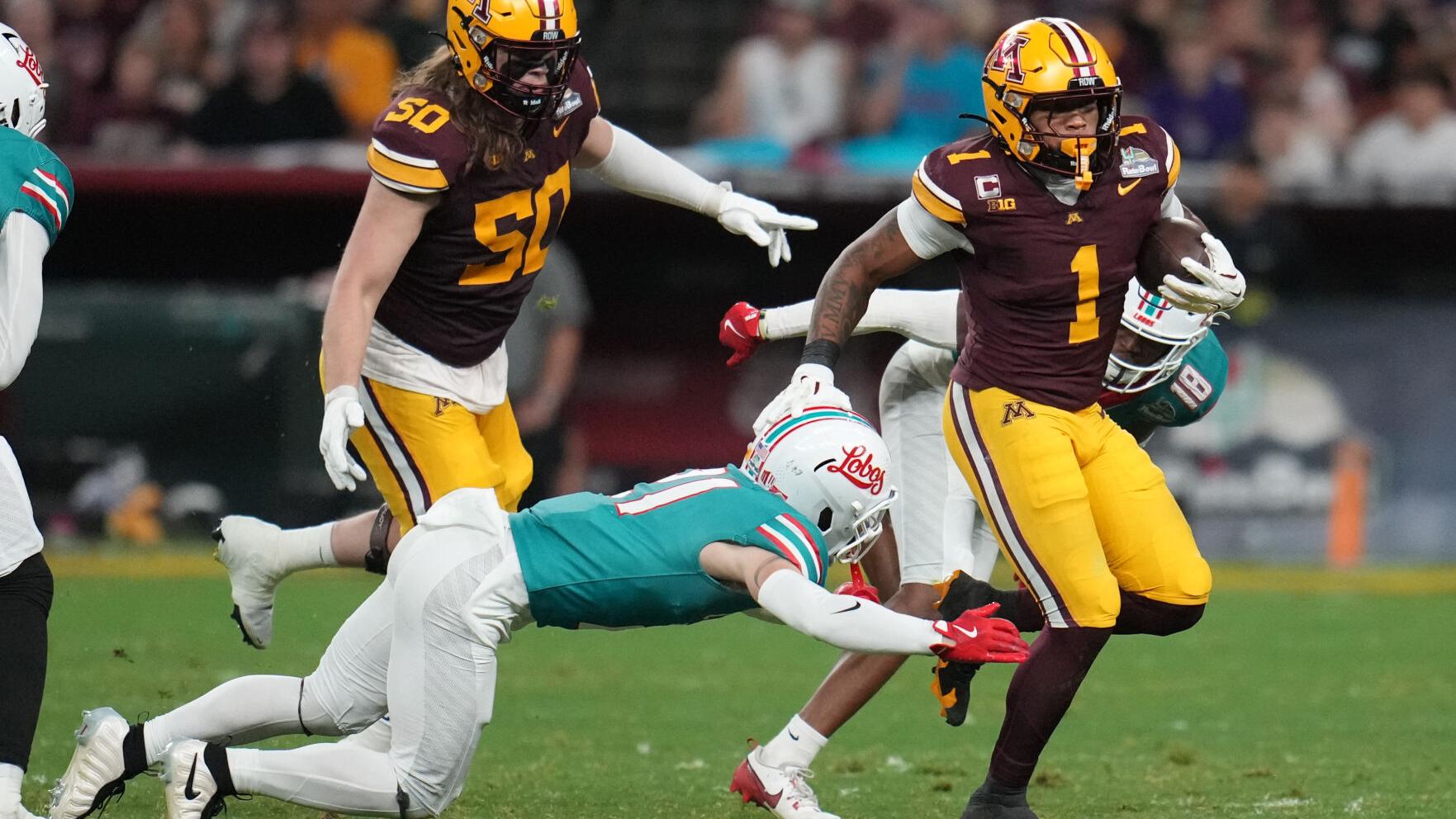 Smith's diving TD catch in overtime sends Minnesota to 20-17 win over ...