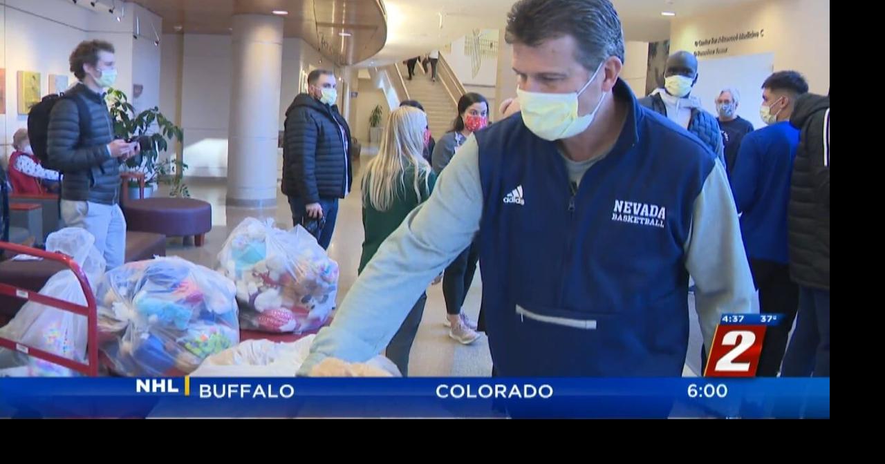 Wolf Pack Basketball Program Hands out Teddy Bears | Local News | 2news.com