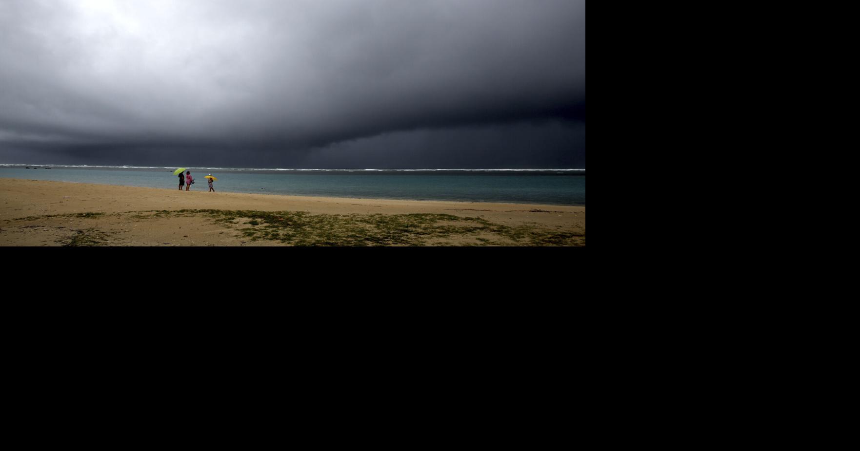 Power restored to parts of Honolulu after record rainfall causes ...