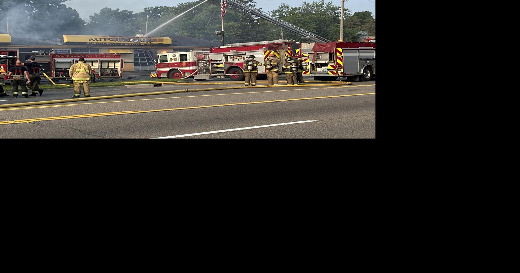 Fire crews respond to a fire at an auto repair shop in Flint Twp ...