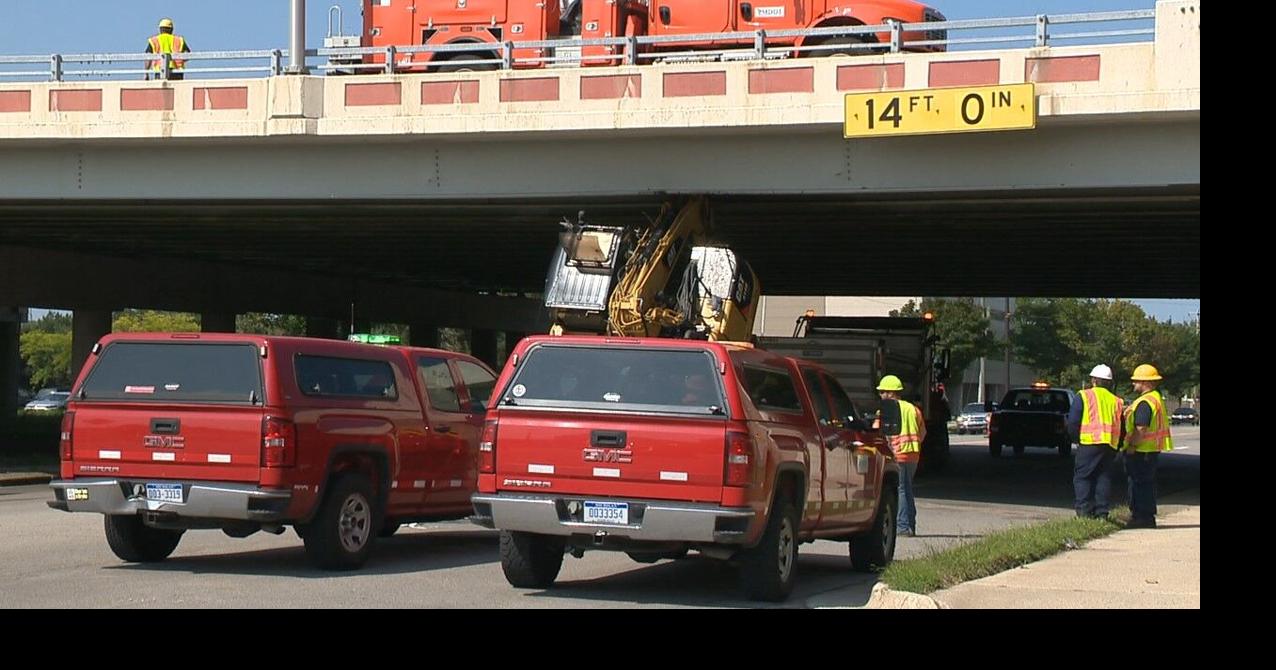 M-13 closed in Saginaw after excavator hits I-675 overpass | Local ...
