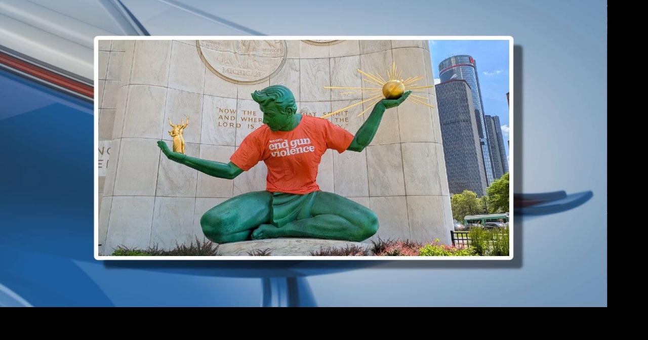 Detroit's Spirit of Detroit dons orange for gun violence march | State ...