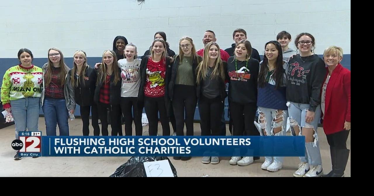 Flushing High School volunteers with Catholic Charities ahead of the ...