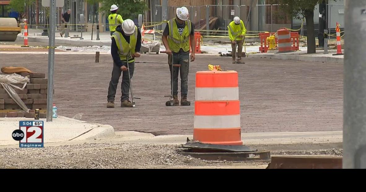 Crews continue laying new Saginaw Street bricks in downtown Flint ...