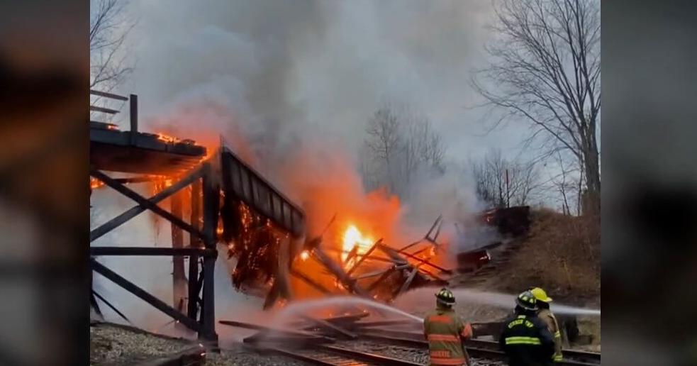 Iconic wooden railroad bridge in Shiawassee County goes up in flames ...