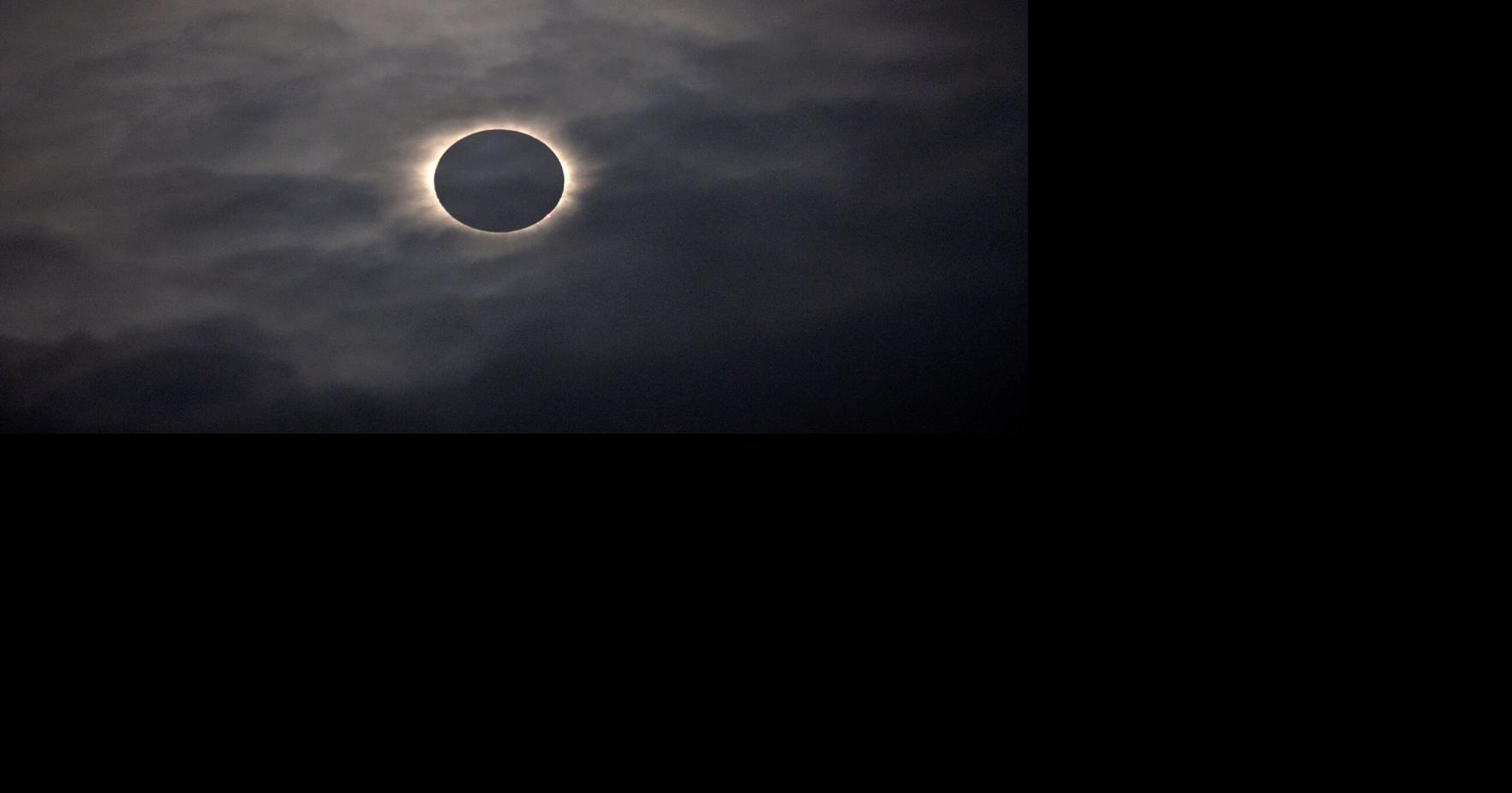 Solar eclipse forecast: Clouds expected to move out of Mid-Michigan ...
