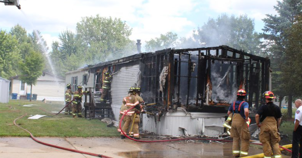 Police: Woman badly burned after setting herself and residence on fire ...