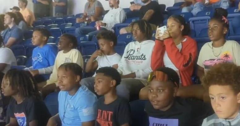 475 Elite Training support Flint native Troy Brown during Lions v ...