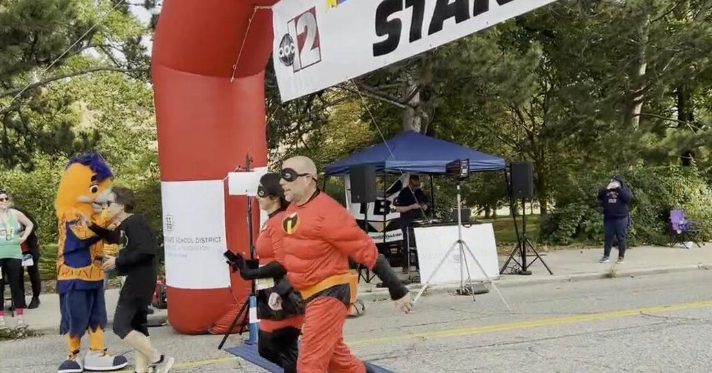 Superheroes united in Flint to run in support of abuse victims | News ...