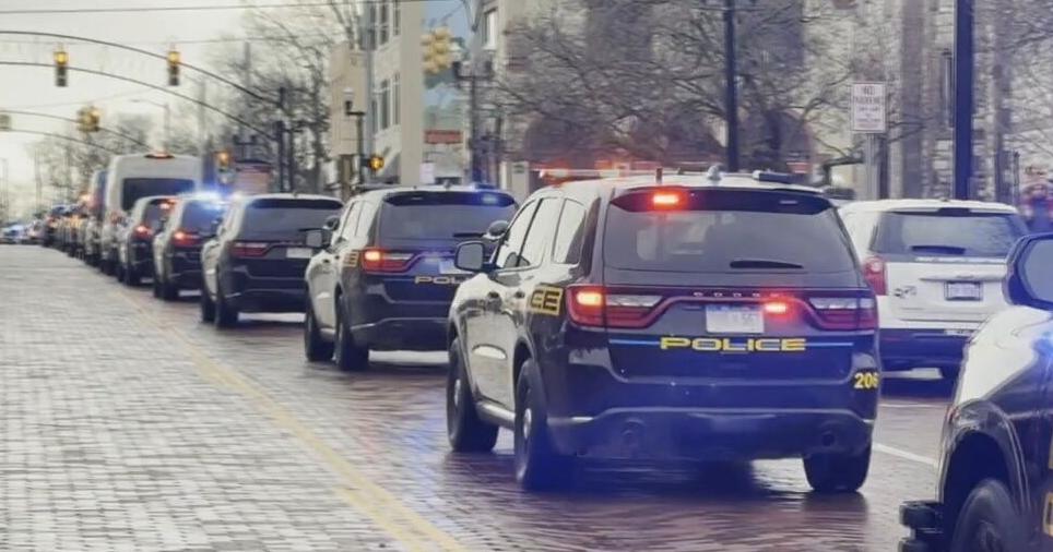 Community pays respects to Flint officer Charles Redmond at funeral ...
