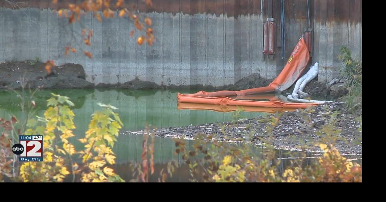 Hazmat crews investigate bright green substance in Flint River | Local ...