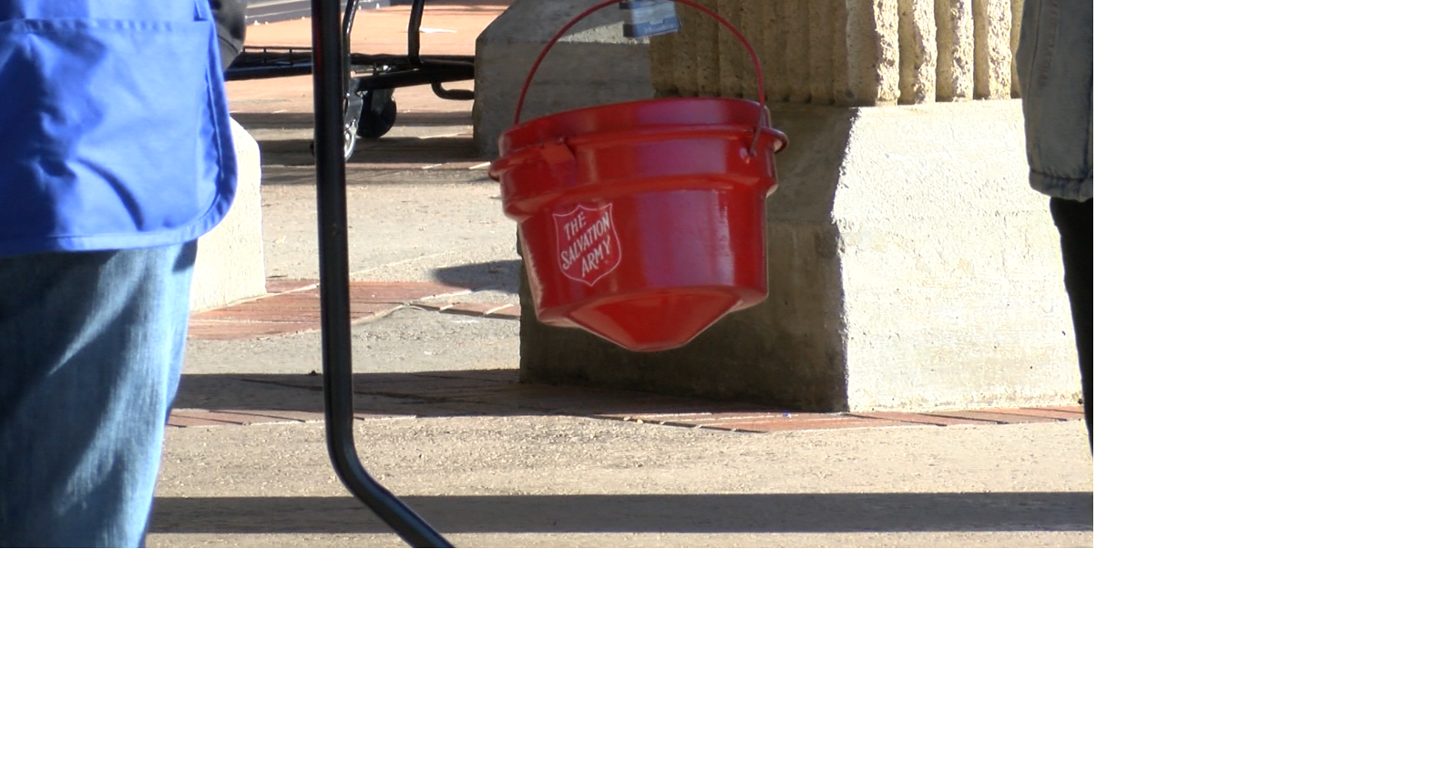 Volunteers from the Salvation Army hard at work ringing bells as part ...