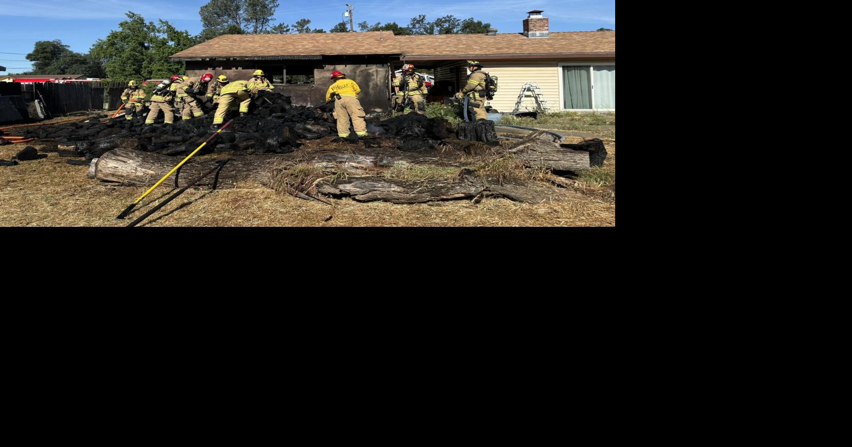 Firefighters respond to vegetation fire that spread to garage in ...