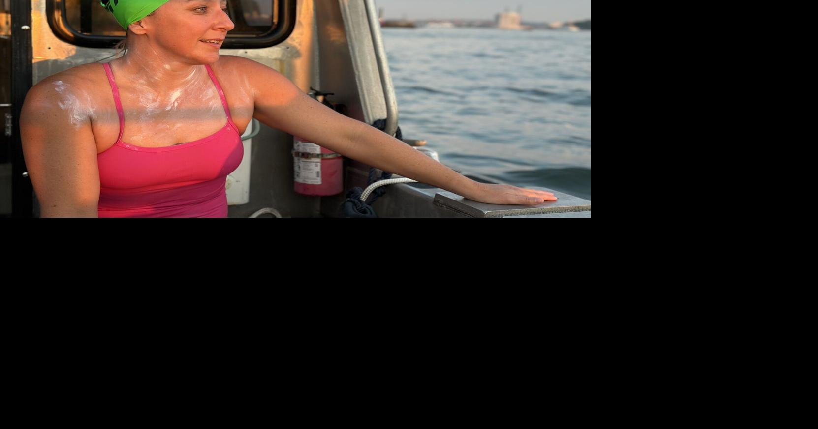 Redding art teacher swims her way to an open water triple crown ...