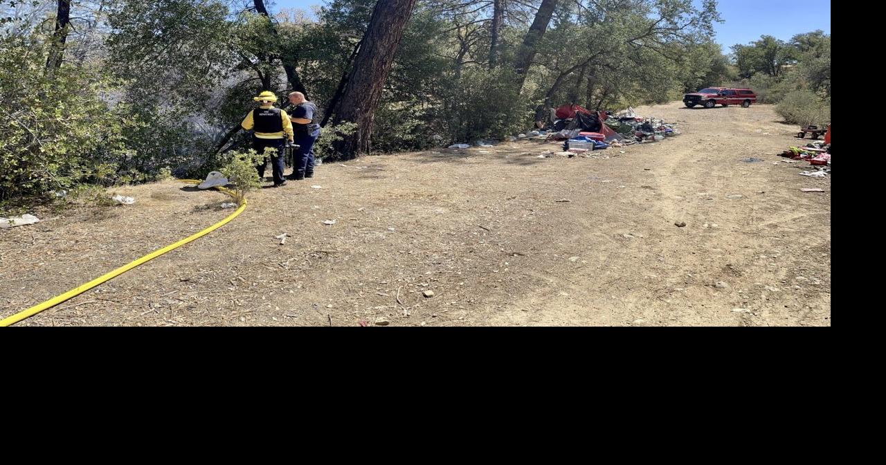 Redding Fire Department stops the spread of vegetation fire behind ...