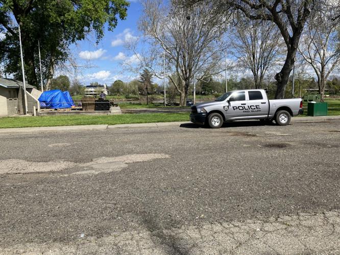 Crews clean up trash and abandoned tents at River Park | News ...