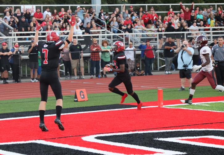 PHOTOS: Granite City debuts new turf field, falls to Champaign Central ...