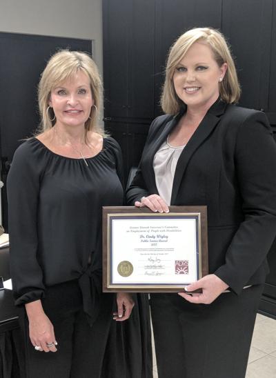 Dr. Wigley honored with Public Service Award | News | advertisergleam.com