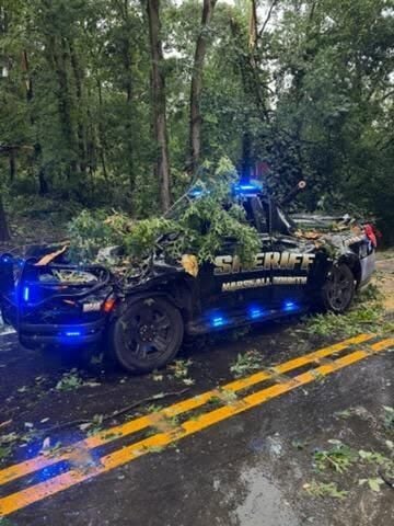 Tree traps deputy in big storm | News | advertisergleam.com