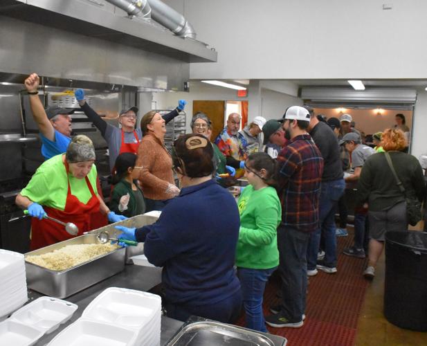 Needy families line up to receive Thanksgiving dinners | Latest Stories ...