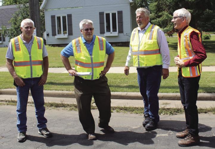 Governor visits Antigo to help fill potholes | Local News ...