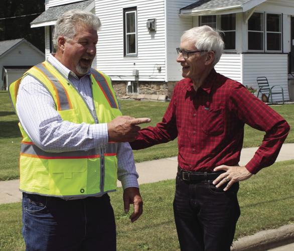 Governor visits Antigo to help fill potholes | Local News ...