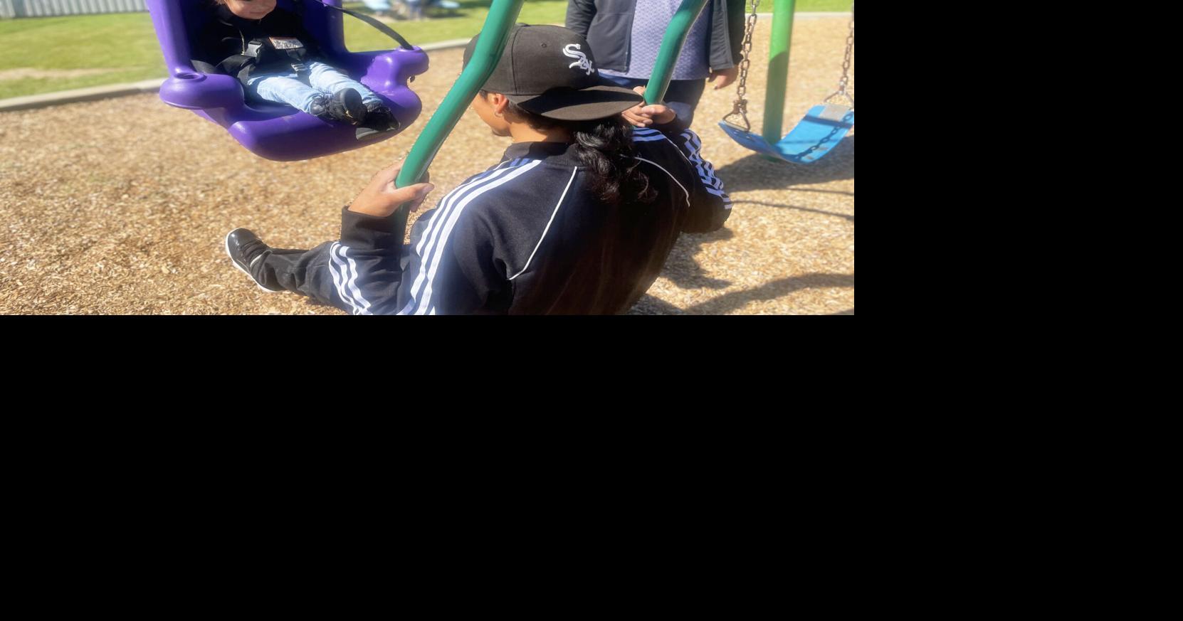 Officials celebrate new ADA swing at Olivehurst park | News | appeal ...