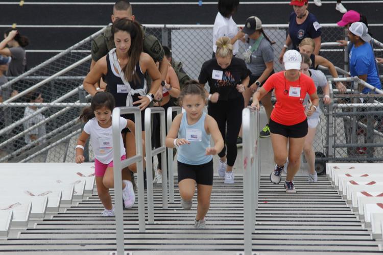 Photos: Hundreds climb West Forsyth stadium to honor 9/11 responders ...