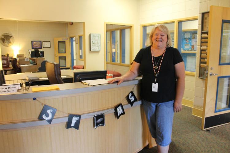 Secretary wears many hats for entire school | School News | appenmedia.com