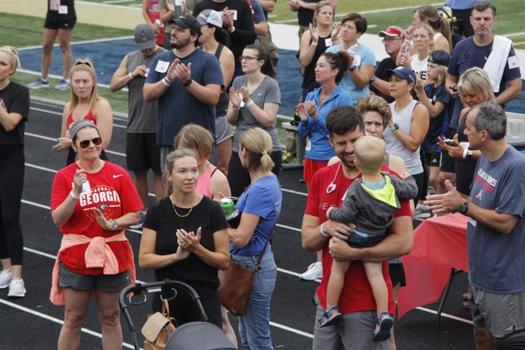Photos: Hundreds climb West Forsyth stadium to honor 9/11 responders ...