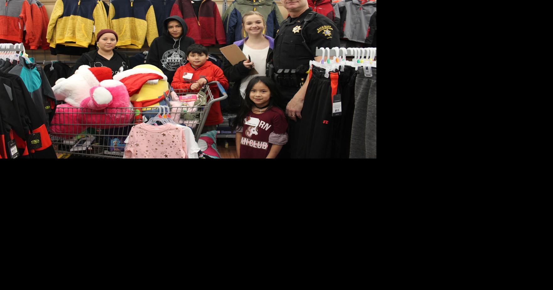 Annual Cops & Kids event unites law enforcement, families for holidays ...
