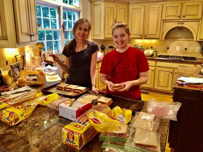 Mother-daughter team delivers sandwiches for homeless | Dunwoody News ...