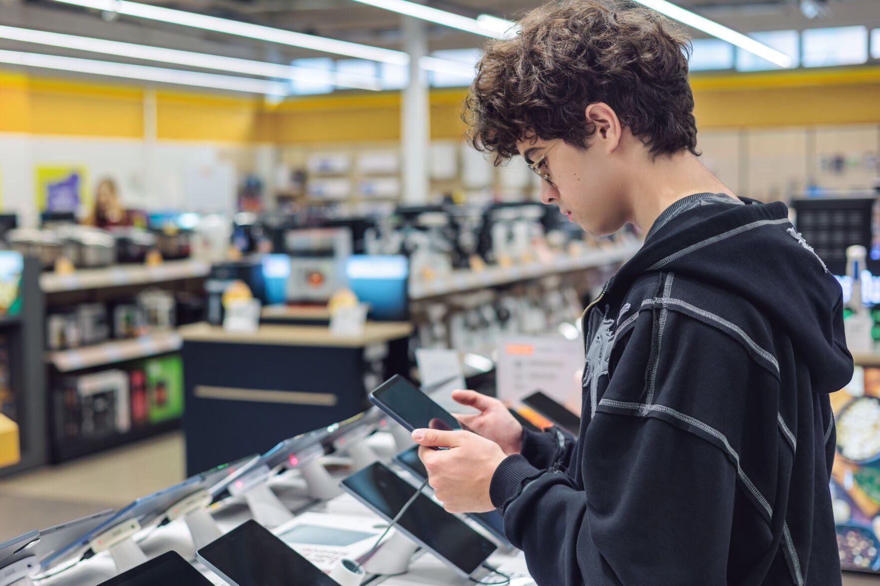 Teenager Choosing a Tablet in Electronics Store – Young Customer ...