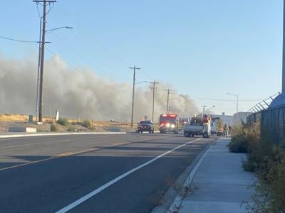 Rapid wildfire burned Kennewick roofing business off U.S. 395 near ...