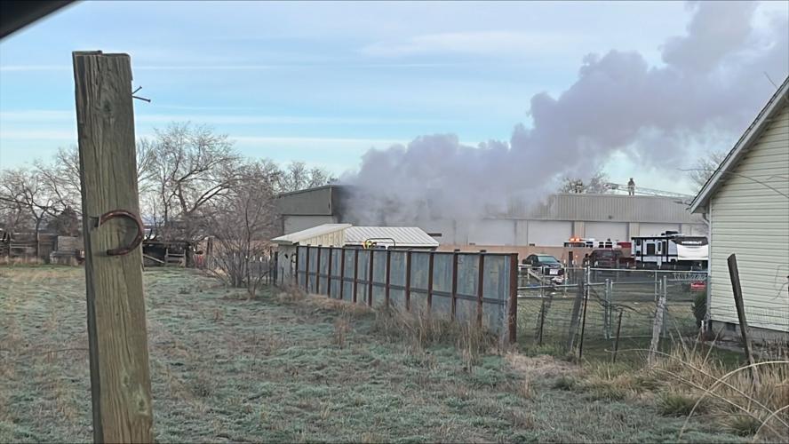 Kennewick firefighters extinguish storage unit fire near busy street ...