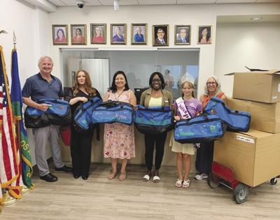 Volunteers gather to help AV children | News | avpress.com