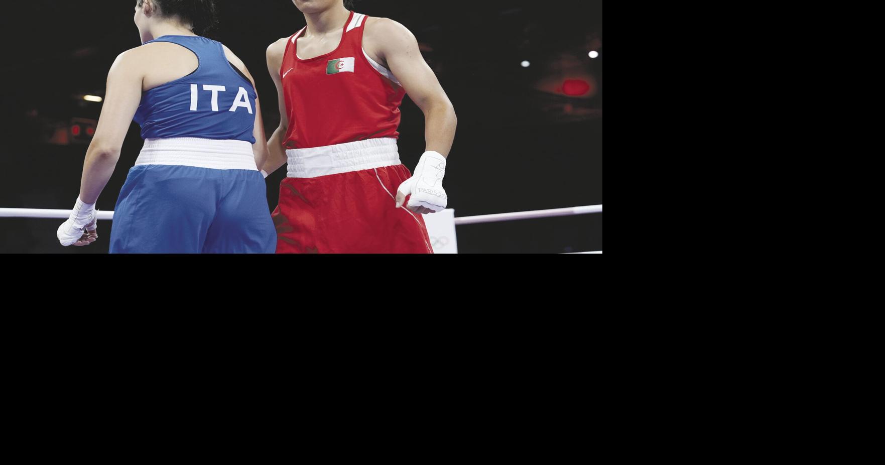 Algeria boxer Khelif wins 1st Olympic fight when opponent Carini quits ...