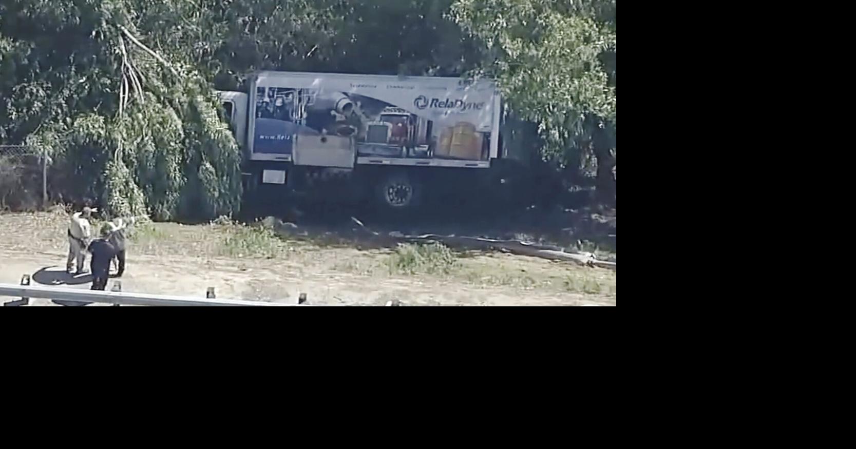 Truck crashes through guardrail; worker killed, another injured | News ...