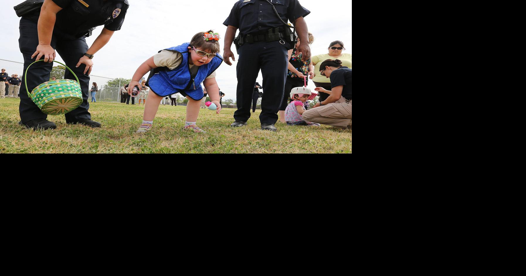 The kind leading the blind: Cops assist visually impaired kids on egg ...