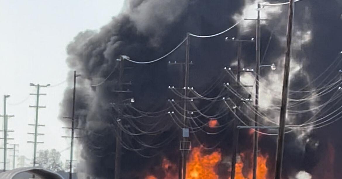 Pile of creosote railroad ties expected to continue burning downtown ...