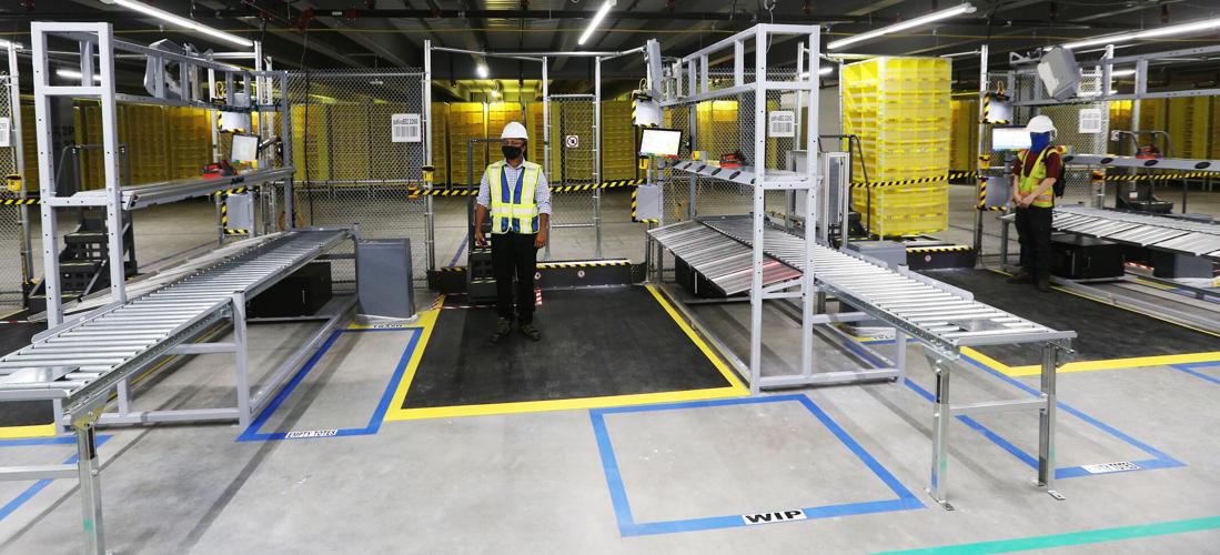 Amazon unveils distribution center, begins mass hiring | The Delano ...