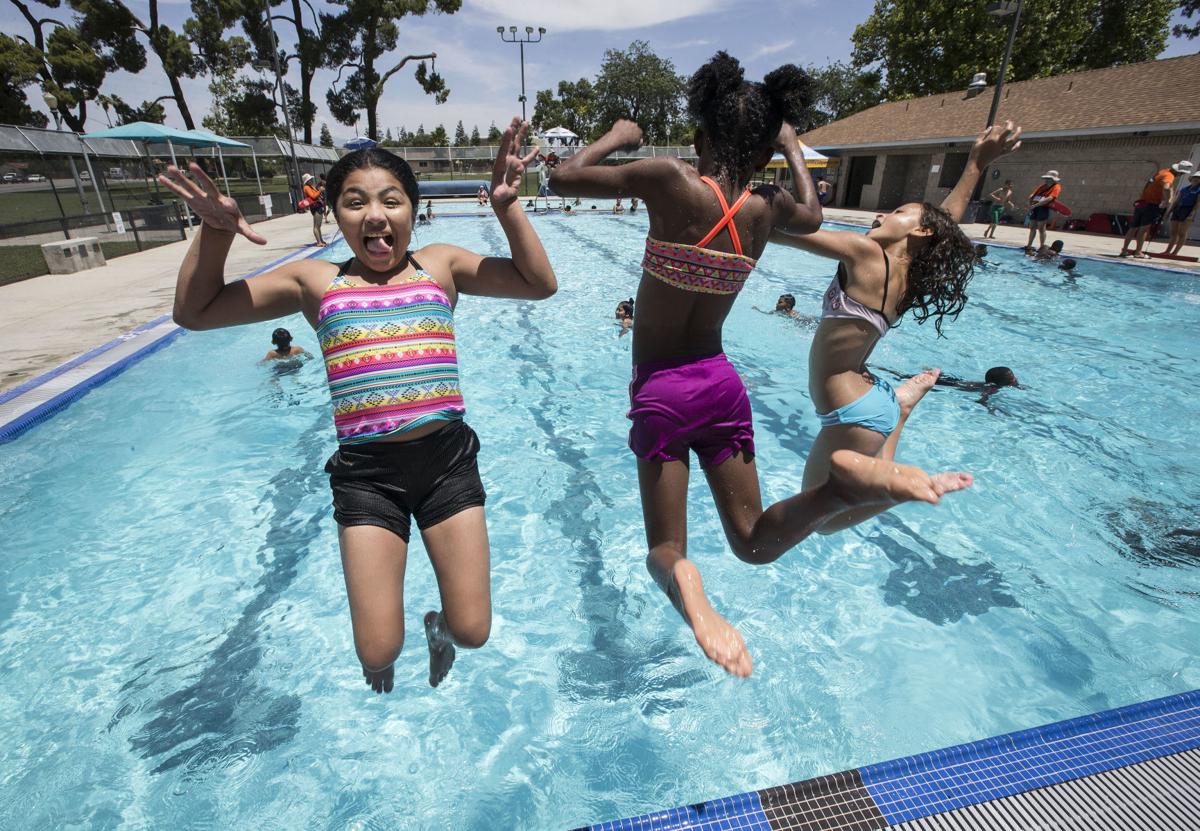 PHOTO GALLERY: Kids dive into Jefferson Pool as temperatures rise ...