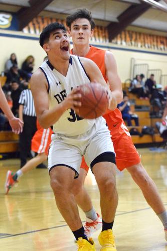 Delano boys basketball beats Mission Oak, battles Porterville in East ...