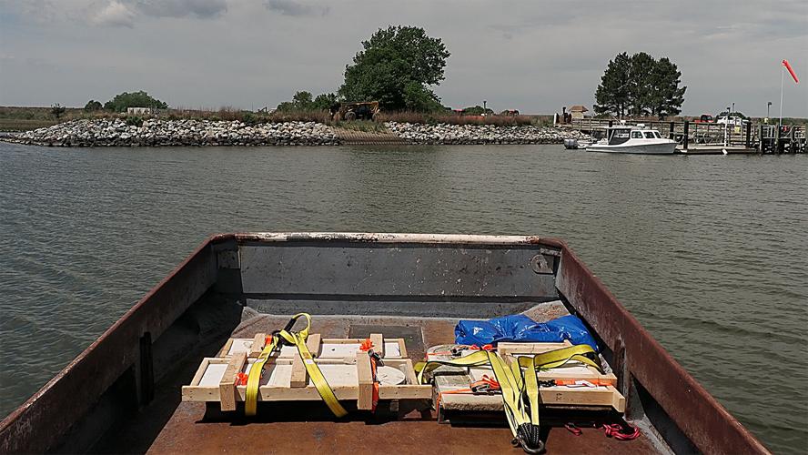After 60 years, gravestones return to a reborn island | People ...