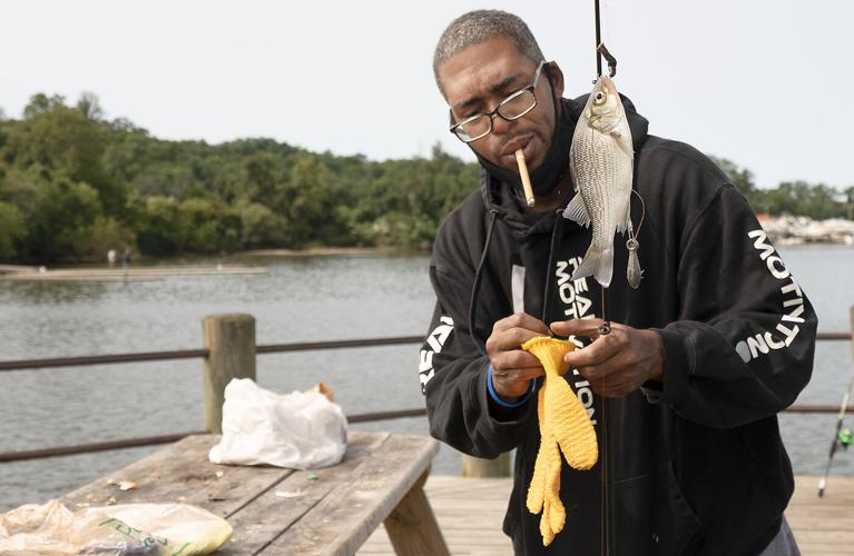 Swimming and fishing safely in the Baltimore Harbor? Not so fast ...