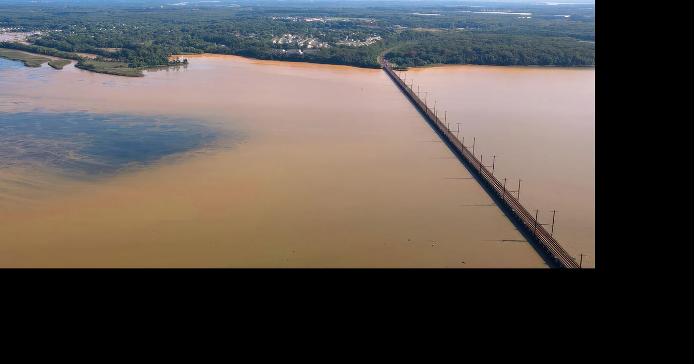 A Maryland river turns orange, Bay grasses disappear | Growth ...