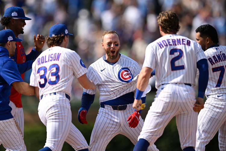 Michael Busch singles in 10th, Cubs benefit from Giants error to beat ...