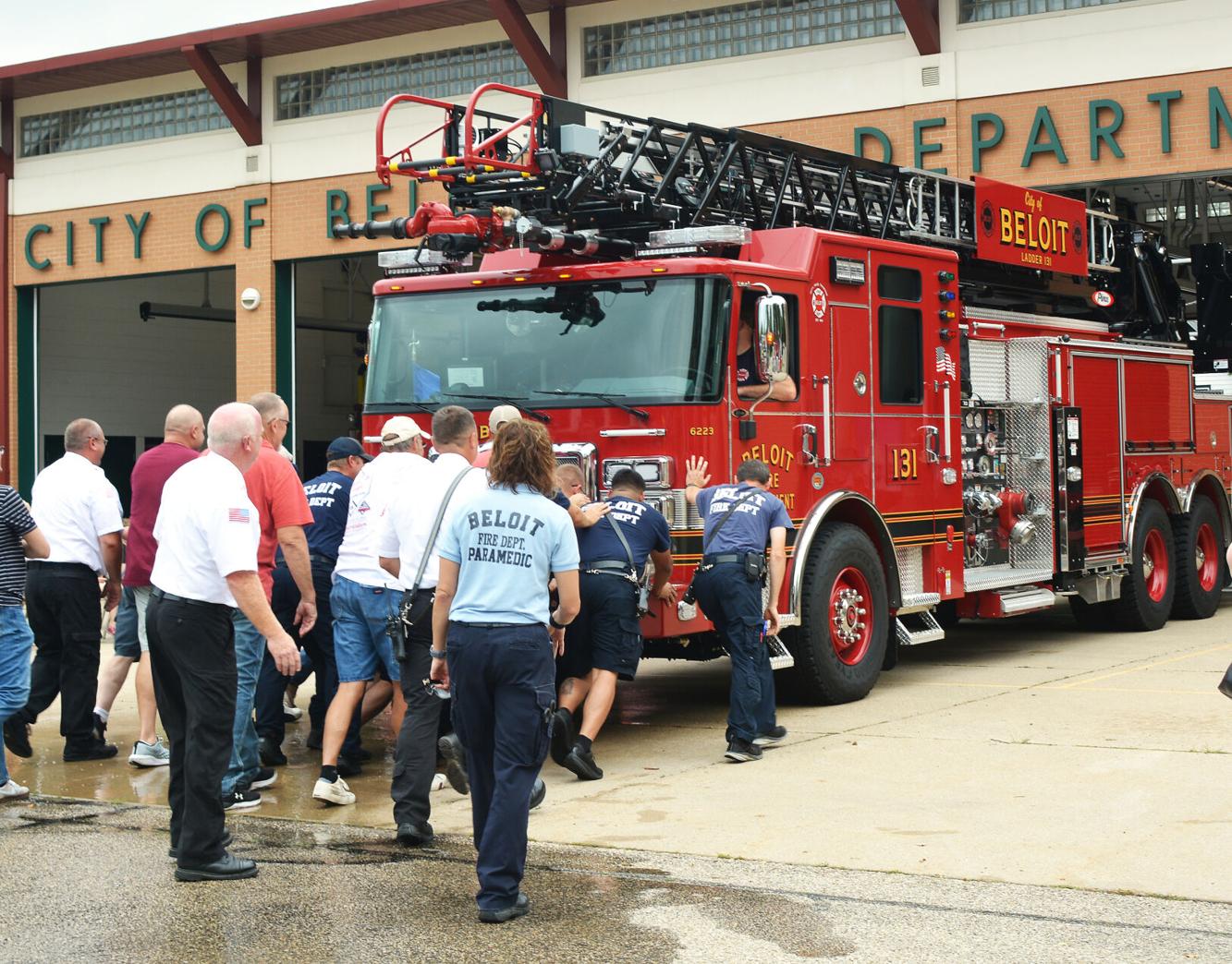 New ladder truck pushed into new home at Beloit Fire Department | Local ...